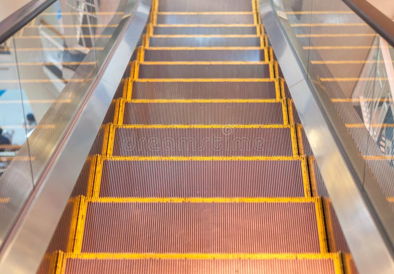 Escalator in a mall. stock image. Image of mall, interior - 67757743