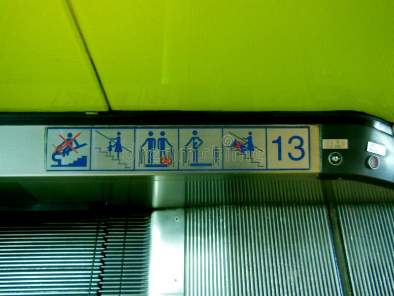 Escalator Signage with Rules Stock Photo - Image of child, escalator ...