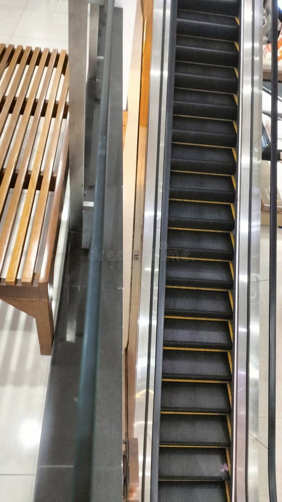 Escalator in the station stock photo. Image of business - 341858704