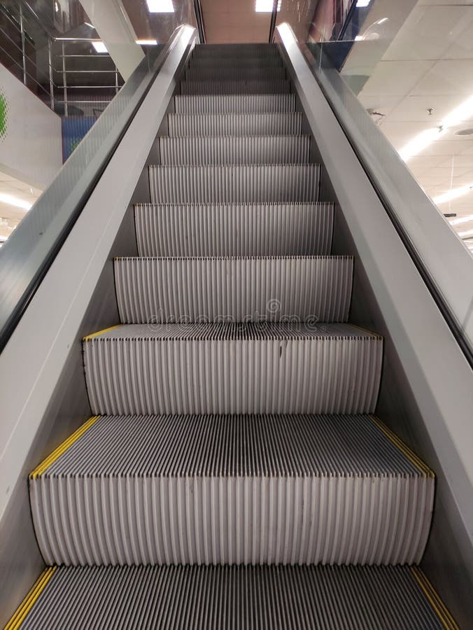 Escalator steps close-up stock image. Image of transport - 245560145