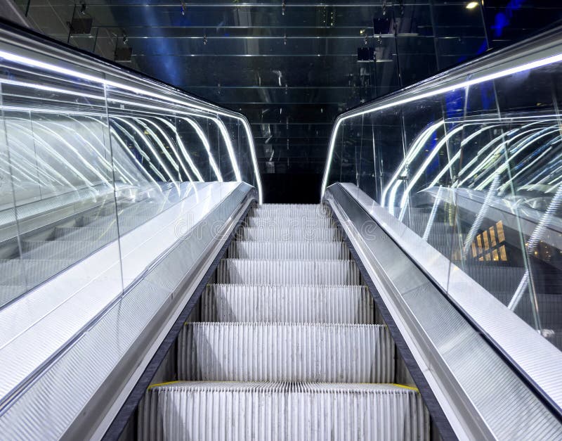 Escalators. Electric Stairs in a Public Area Stock Photo - Image of ...