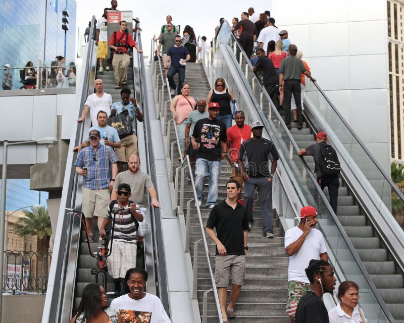 Escalators with people editorial photography. Image of people - 53772757