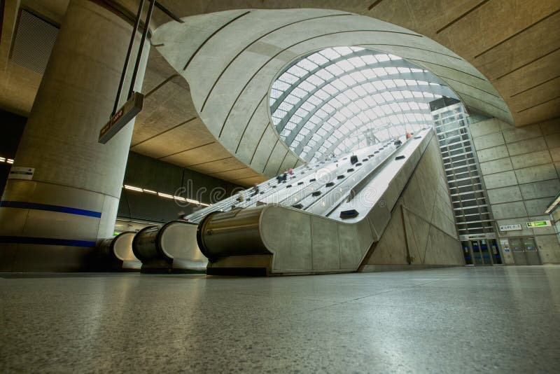 Canary Wharf, DLR Station. DLR Train Leaving the Station on a Br ...