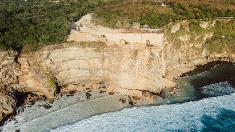 Escalators Working and Digging Cliff in Uluwatu, Bali. Aerial View ...