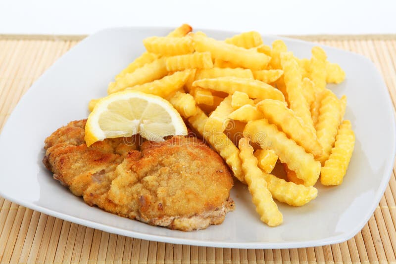 Escalope with french fries stock photo. Image of veal - 87305122