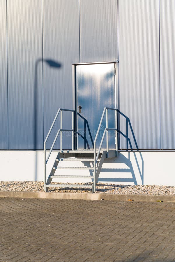 Escape door with stairs stock image. Image of exit, white - 197776417