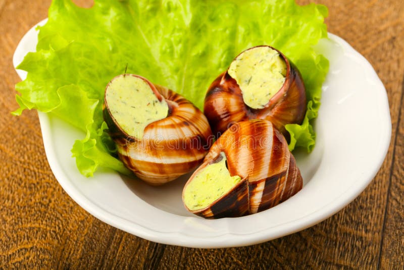 Escargot immagine stock. Immagine di ristorante, burro - 112199619