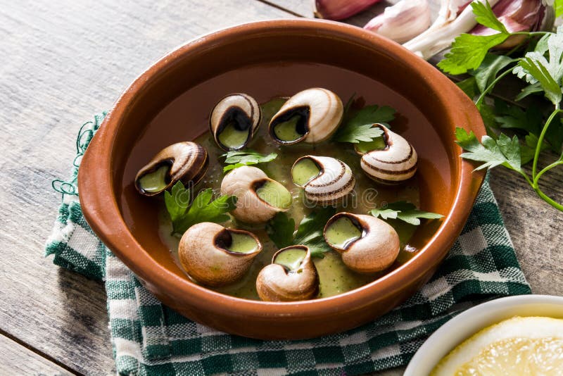 Escargots De Bourgogne. Snails with Herbs and Garlic Butter. Stock ...
