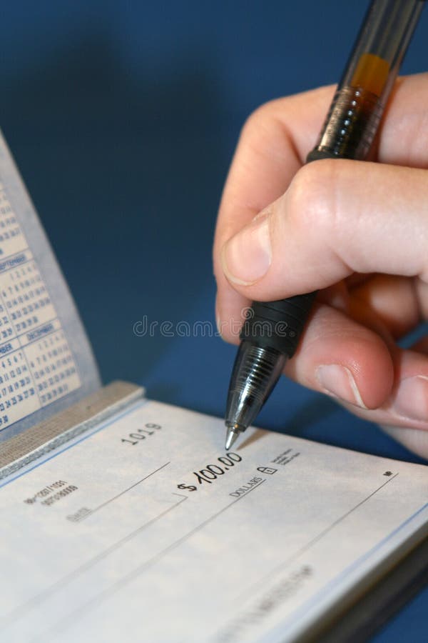 Escritura de cheques foto de archivo. Imagen de deba, finanzas - 4387848