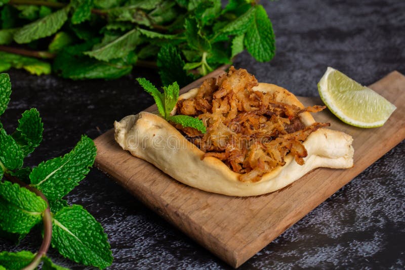 Esfiha Arabic. Traditional Open Meat Sfiha with Onion Stock Photo ...