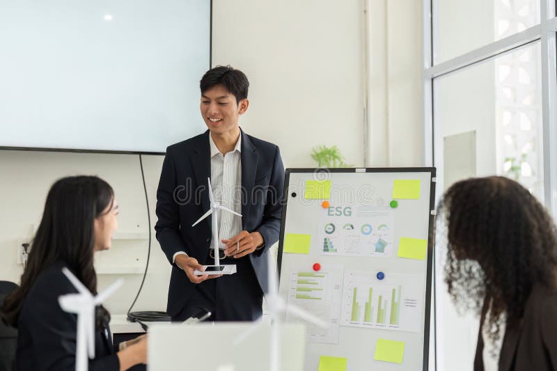 ESG Data Analysis and Team Engagement. Professionals Analyzing ...