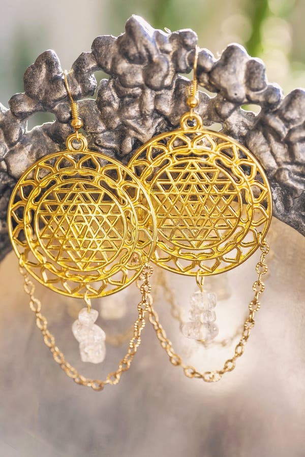 Esoteric earrings stock photo. Image of metal, natural - 93815158