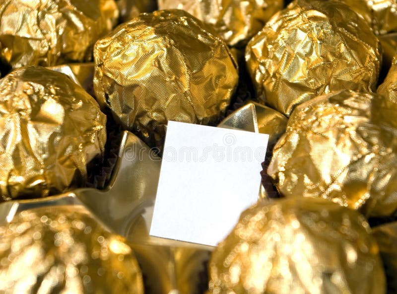Chocolates de oro foto de archivo. Imagen de amarillo - 7803394