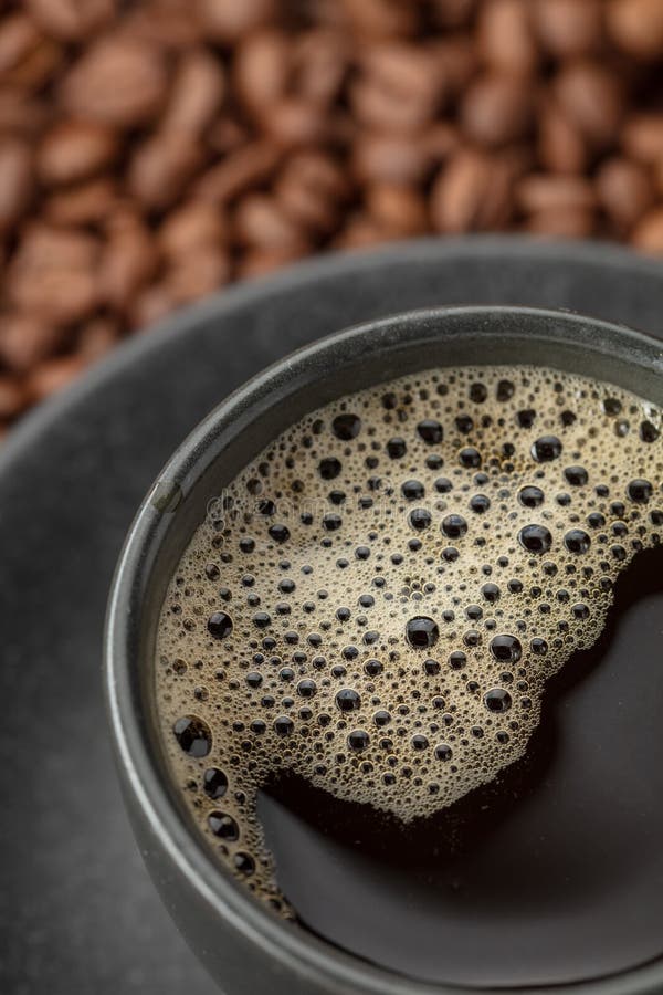 Espresso and coffee beans stock image. Image of bean - 331532683