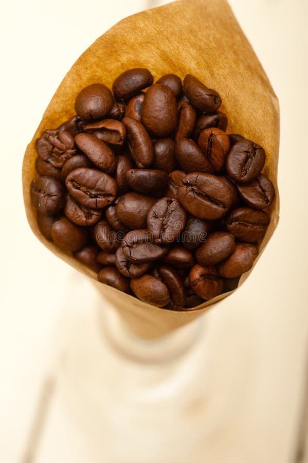 Espresso Coffee Beans on a Paper Cone Stock Image - Image of cornucopia ...