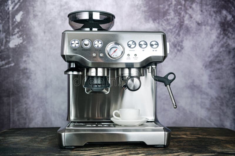 Espresso Coffee Maker with Coffee Cup Against Gray Wall Closeup Stock ...