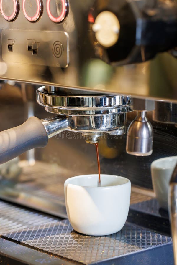 Espresso Machine Brewing Fresh Coffee into a Cup Stock Photo - Image of ...