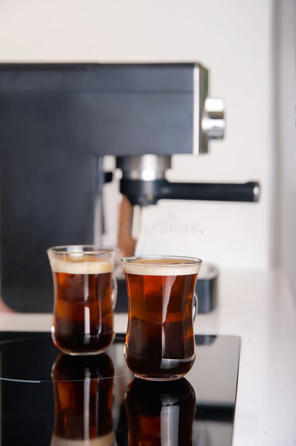 Espresso Machine Brewing Fresh Coffee in Glass Cups Stock Image - Image ...