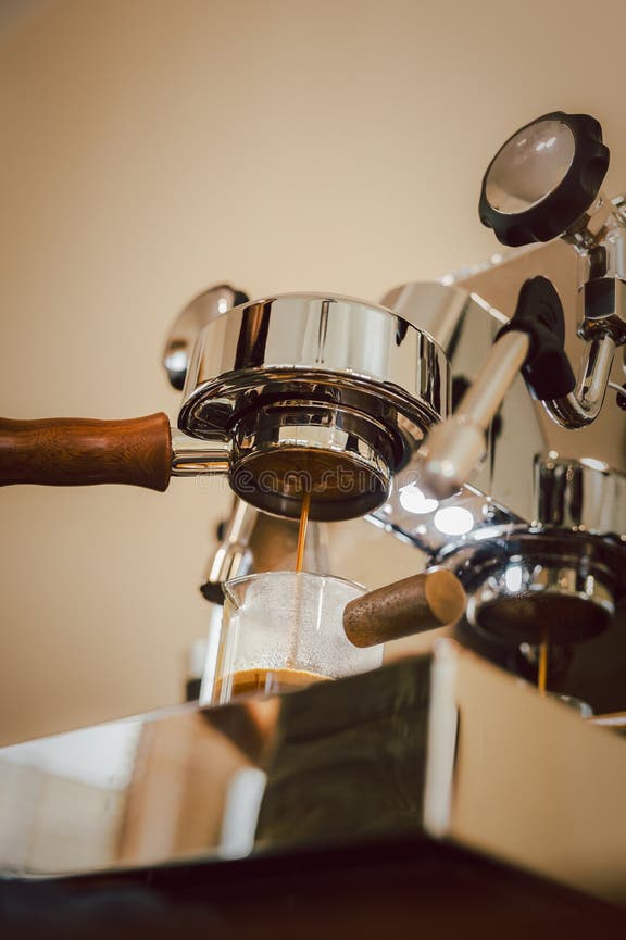 Espresso Machine Making an Espresso with a Bottomless Portafilter ...