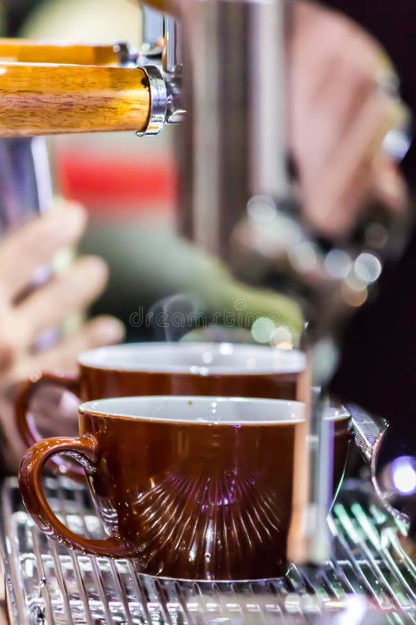 Espresso Machine Pouring Fresh Coffee into Cups at Local Coffee Shop ...