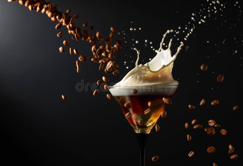 Espresso Martini Drink with Splashes and Falling Coffee Beans on a ...
