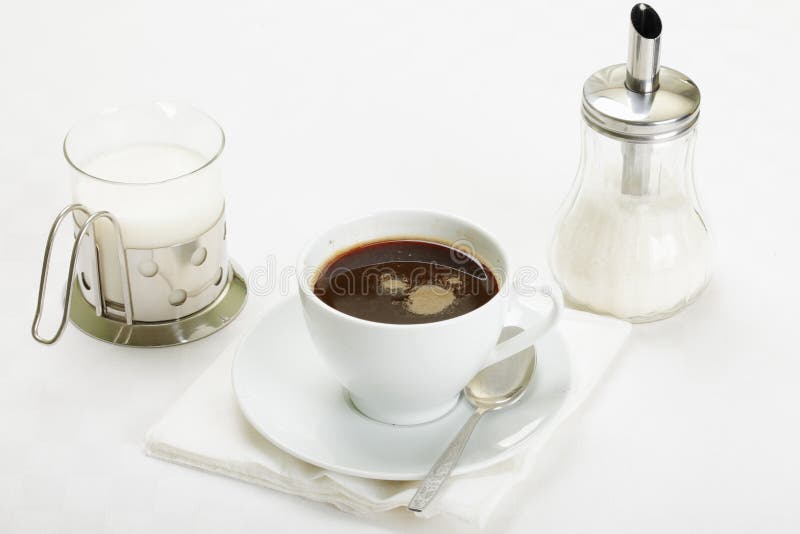 Coffee with milk and sugar stock photo. Image of plate - 16634922