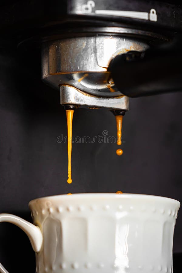 Espresso Shot Pouring Out of an Espresso Maker Stock Image - Image of ...