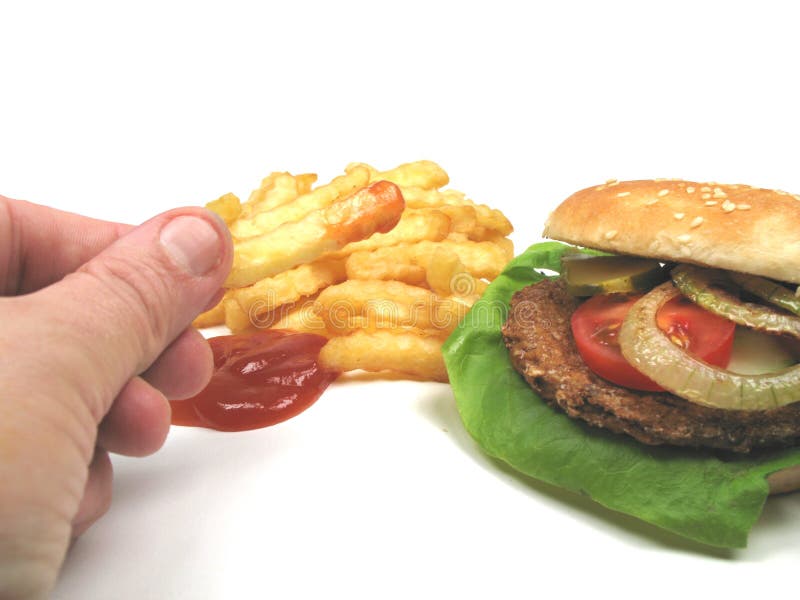 Essen des Fastfoods stockfoto. Bild von gebacken, finger - 6825152