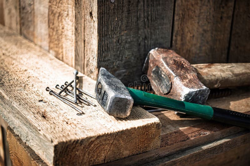 Essential Carpentry Tools Laid Out on a Workbench, Featuring Nails, a ...