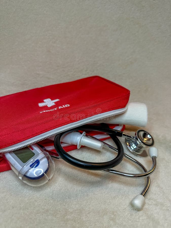 Essential First Aid Kit with Medical Equipment Display Stock Photo ...
