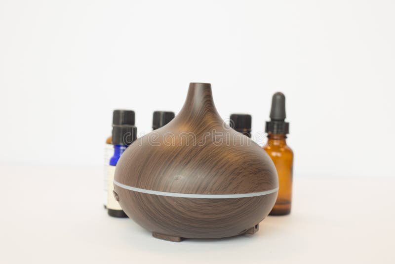 Essential Oil Diffuser with Glass Bottles Stock Photo - Image of vapor ...