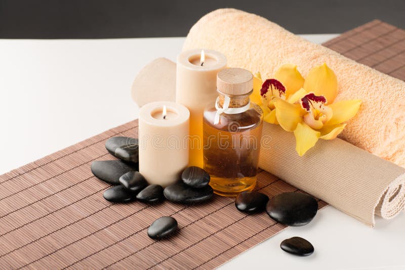 Essential Oil, Massage Stones and Orchid Flower Stock Photo - Image of ...