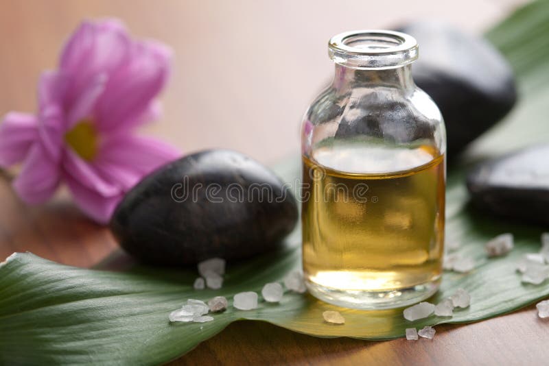 Massage Oil, Stones and Bamboo Stock Photo - Image of hygiene, health ...
