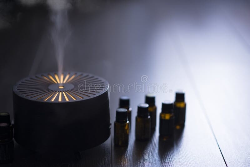 Aromatherapy Essential Oils As Natural Remedies with Oil Dripping from ...