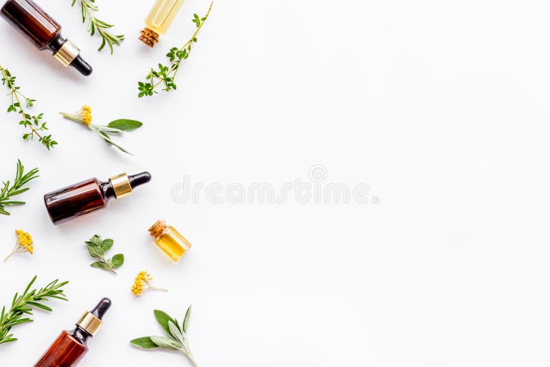 Essential Oils and Fresh Herbs on White Background Top View Pattern ...