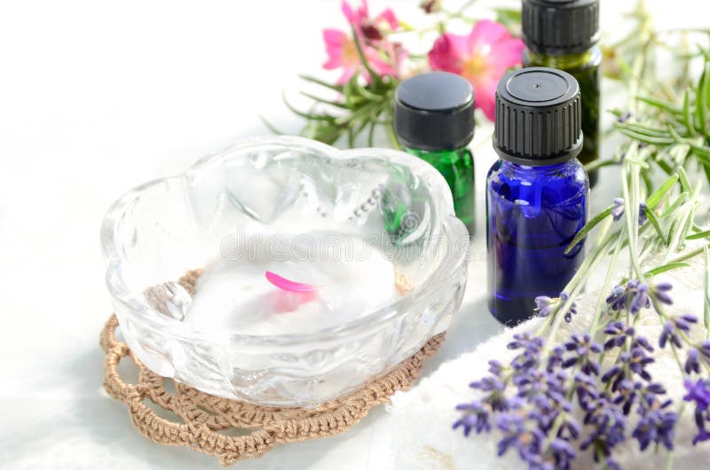 Essential Oils with Herbs and Moisturizer Cream Stock Photo - Image of ...