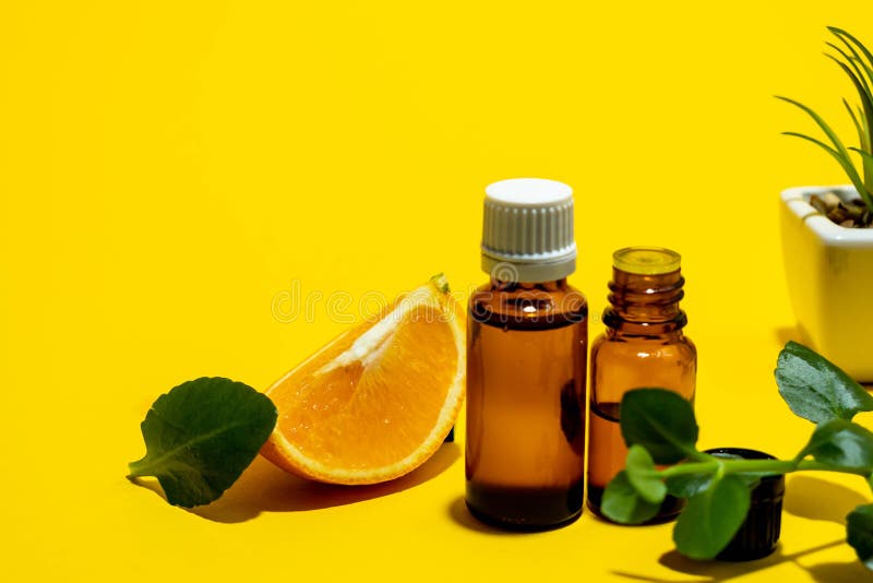 Orange Essential Oils , Various Bottles Aromatherapy on a Yellow ...