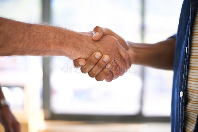 Establishing Solid Bonds. Cropped View of Two Men Shaking Hands Indoors ...