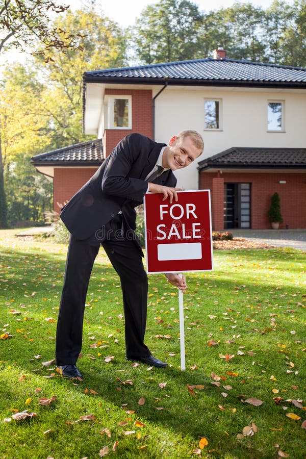 Estate Agent Trying To Sell House Stock Image - Image of occupation ...