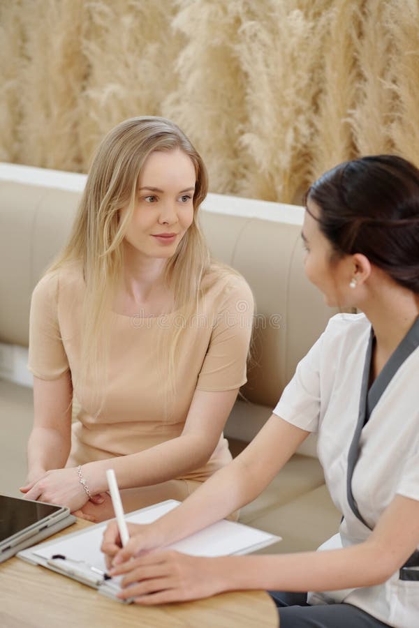 Esthetician Talking To Client Stock Image - Image of staff, bonding ...