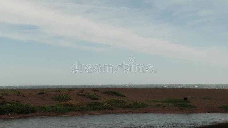 Estuary Water Beach and Ocean with Distant Ship Stock Video - Video of ...