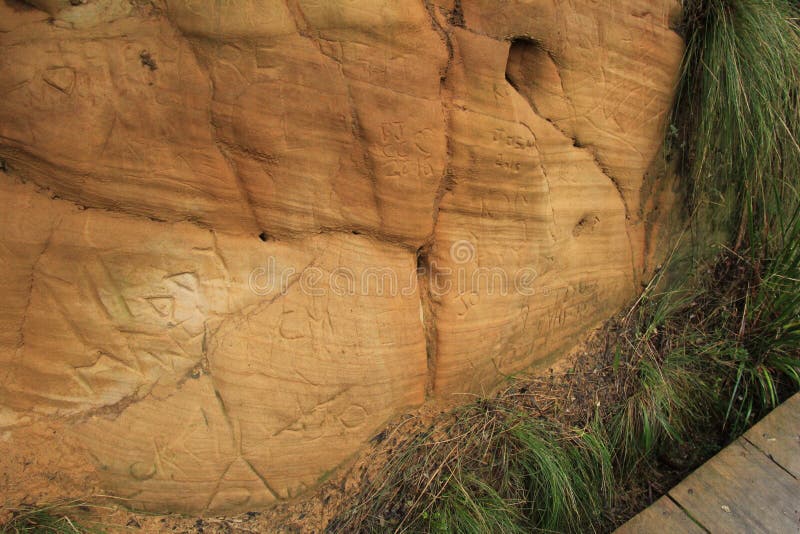 Etching on Rock Wall stock photo. Image of habit, society - 89629110