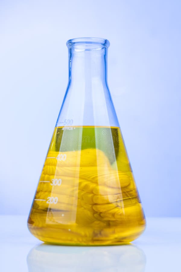 Ethanol Biofuel Derived from Corn Maze with Beaker in Laboratory. Maze ...