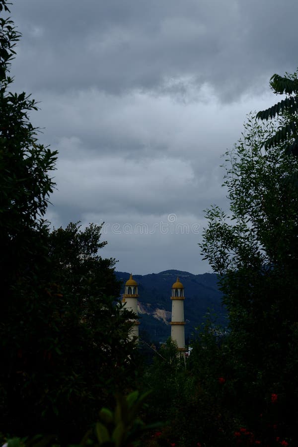 Ethereal Towers: Harmonizing Architecture and Nature Stock Photo ...