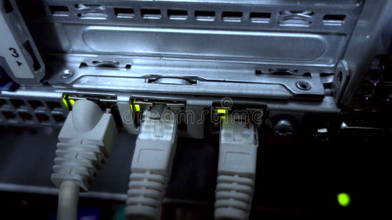 Ethernet Network Connection Hub. Blinking Lights in a Dark Server Room, Close-up View of ...