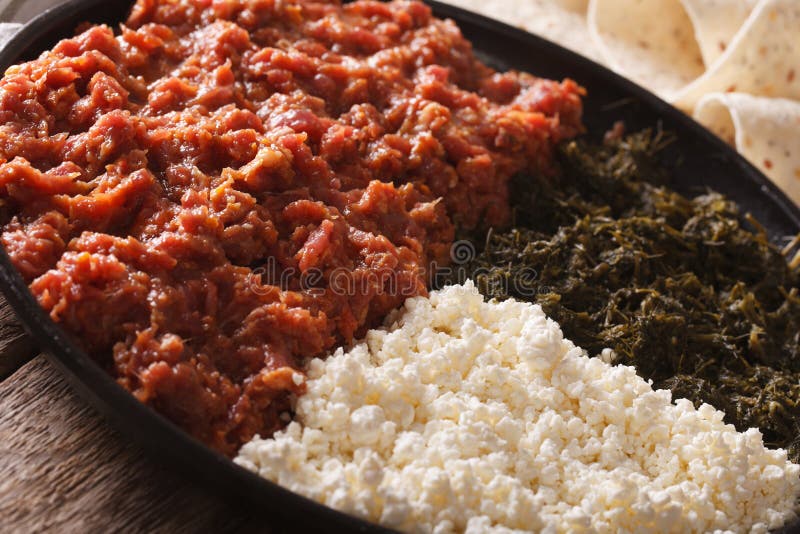 Ethiopian Kitfo with Herbs and Cheese Ayibe Close-up. Horizontal Stock ...