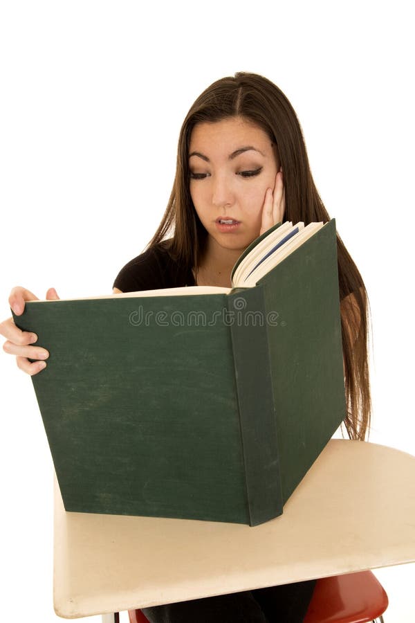 Ethnic Girl Sitting at School Desk Reading a Book Stock Image - Image ...