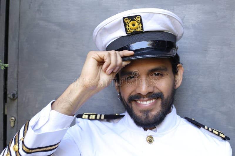 Ethnic Nautical Captain Close Up Stock Image - Image of anchor, male ...
