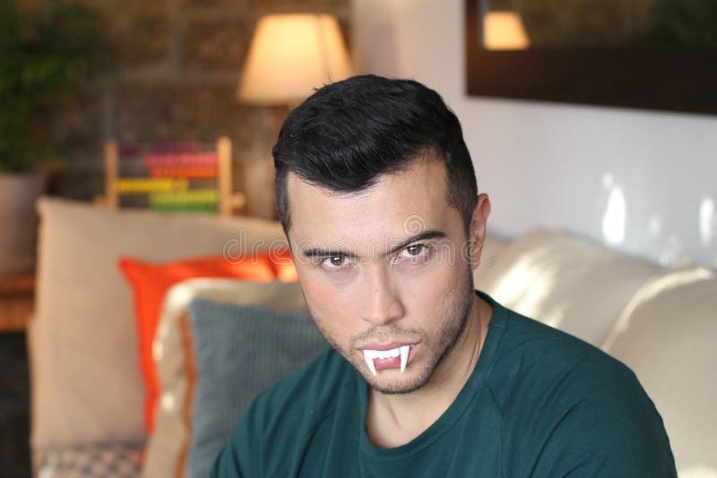 Ethnic vampire in the sofa stock image. Image of mysterious - 198156931