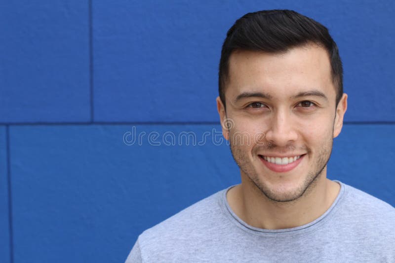 Ethnically Ambiguous Man in Orange Background Stock Photo - Image of ...